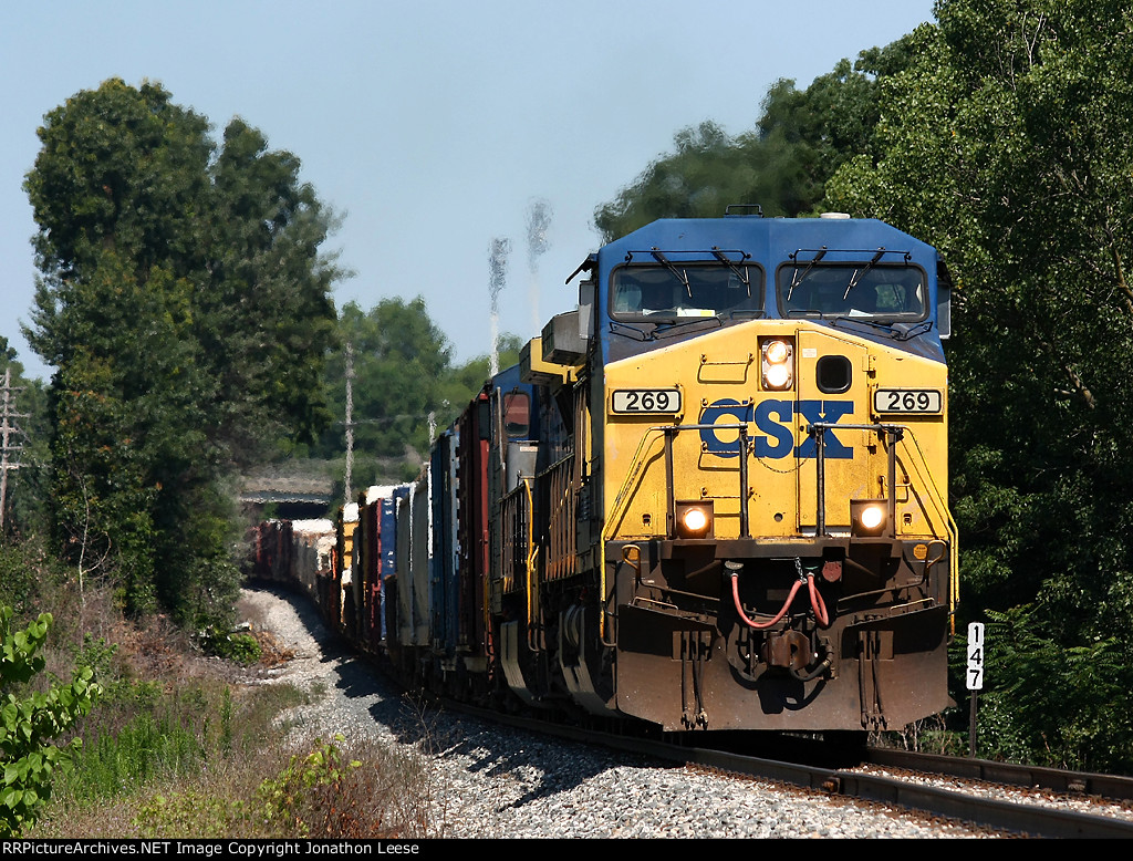 CSX 269 leads another CW44AC east with Q334 past CH 147